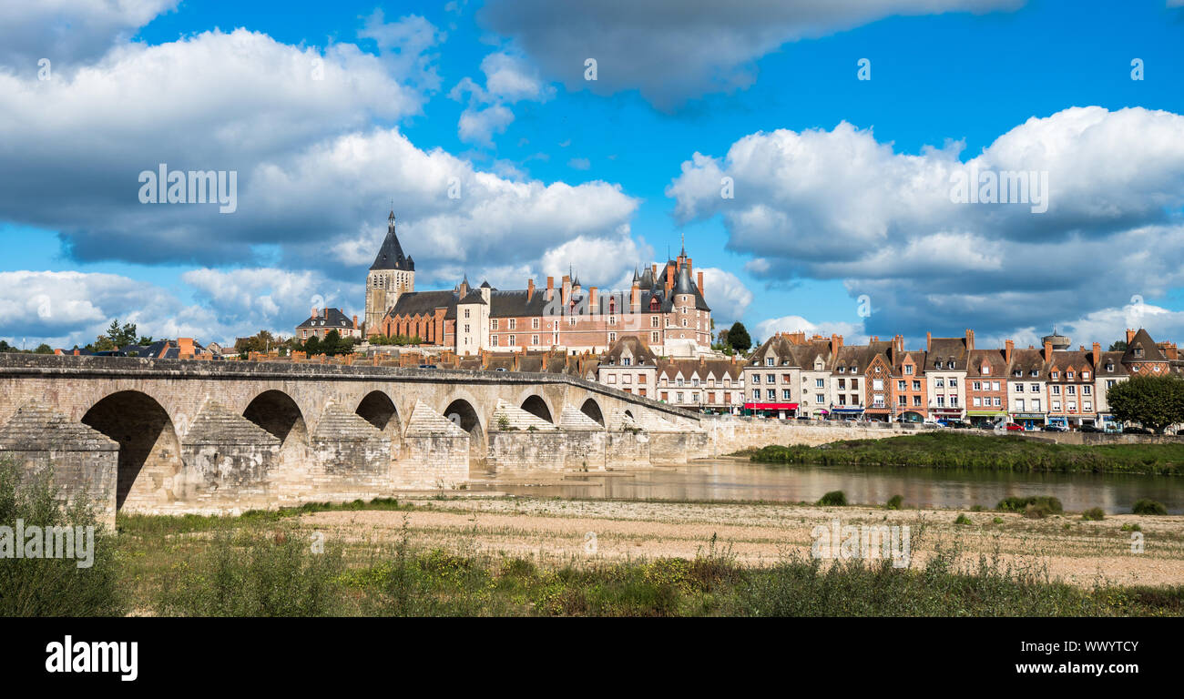View of Gien with the castle and the old bridge across the Loire river ...