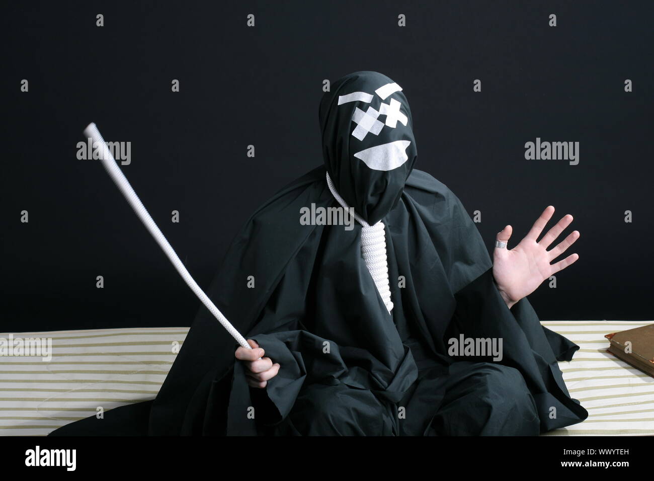 black mime with rope on neck Stock Photo - Alamy