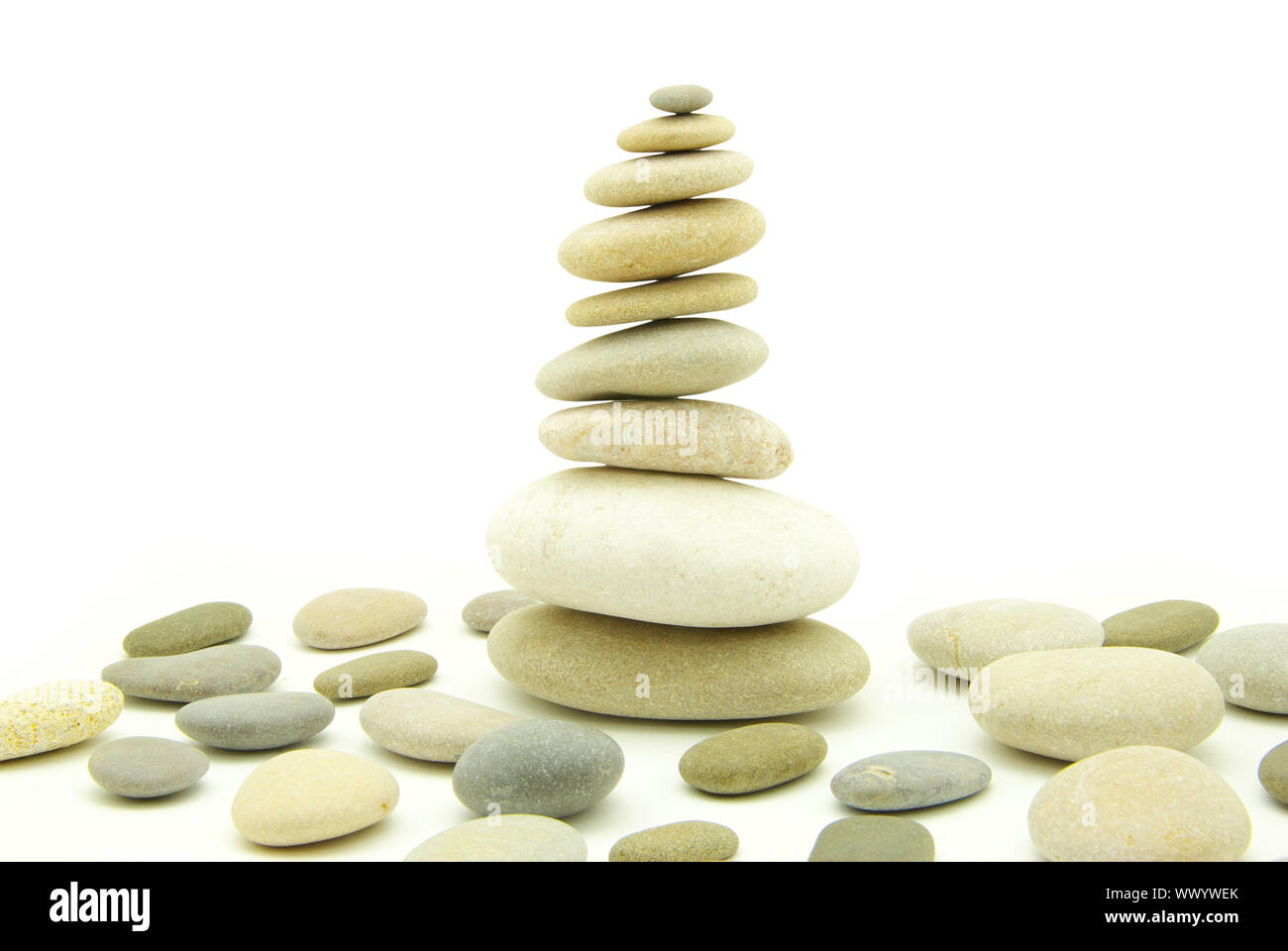 Stack of balanced stones on a white background Stock Photo - Alamy