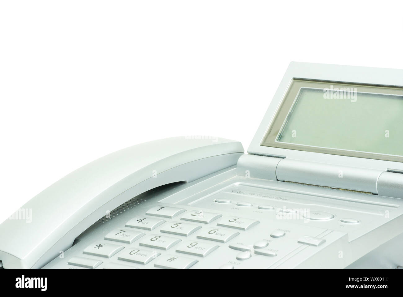 grey office telephone on a white background Stock Photo - Alamy