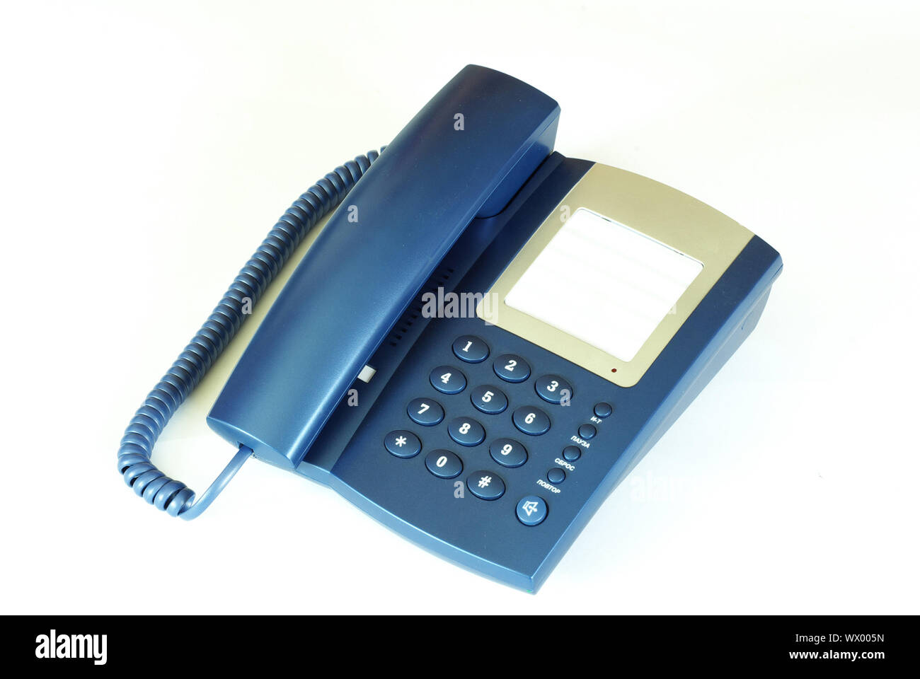 blue office telephone on a white background Stock Photo - Alamy