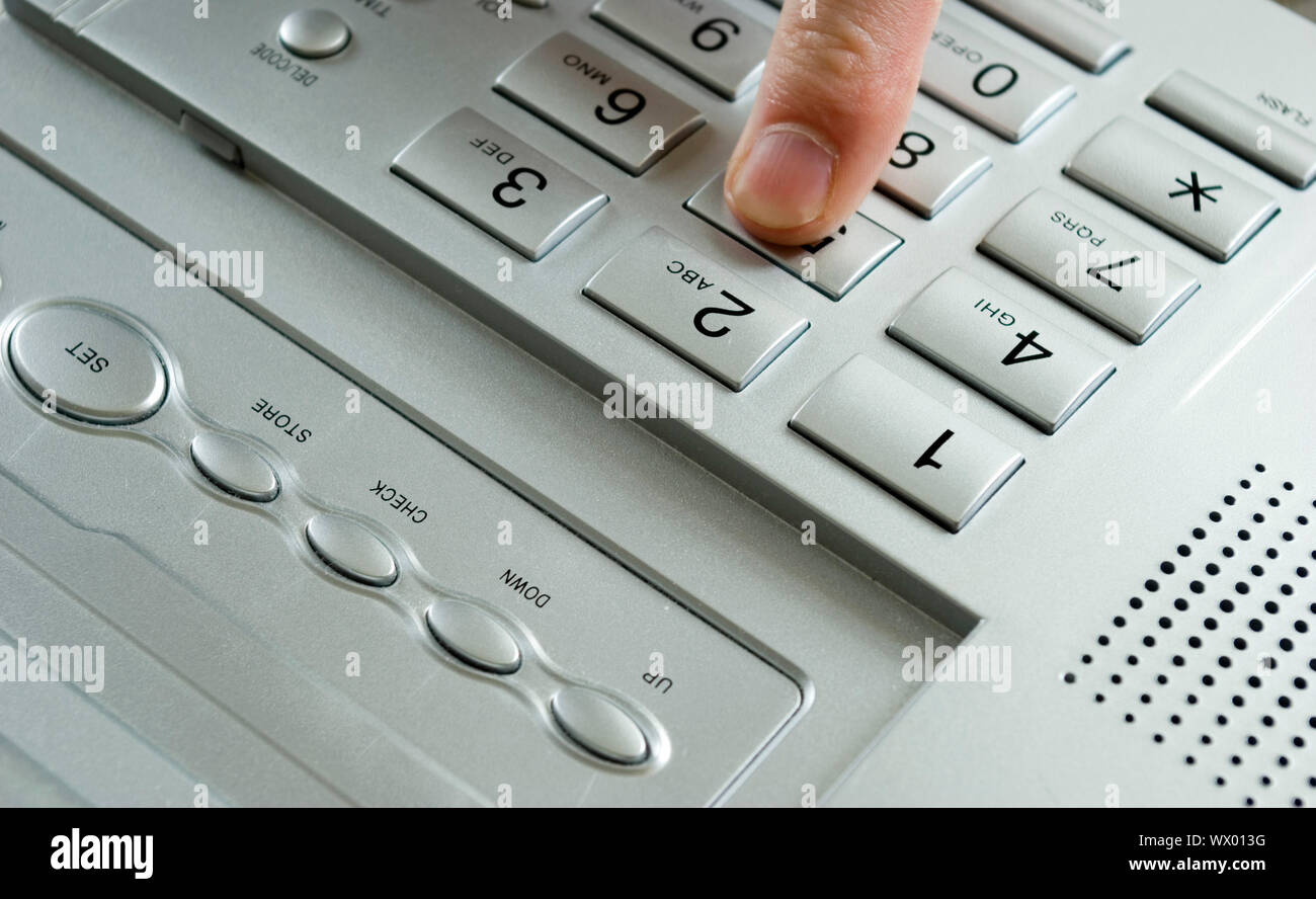 finger with grey telephone keypad Stock Photo - Alamy