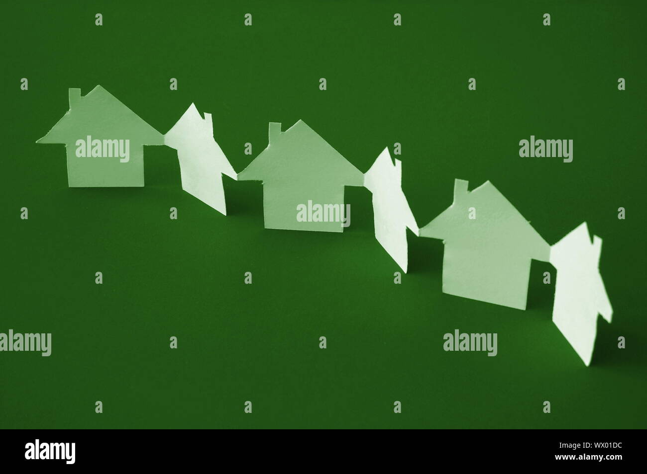 house of paper showing a concept for home and neighborhood Stock Photo ...