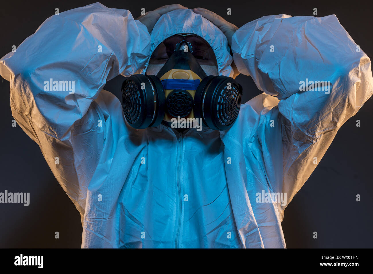 Quarantine, virus infection concept. Man in protective suit and antigas ...