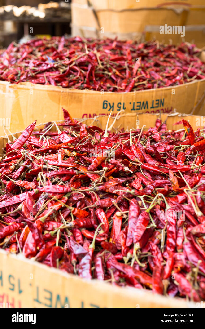 Close-up from red chili pepper in cartons in a grocery store in Galle ...