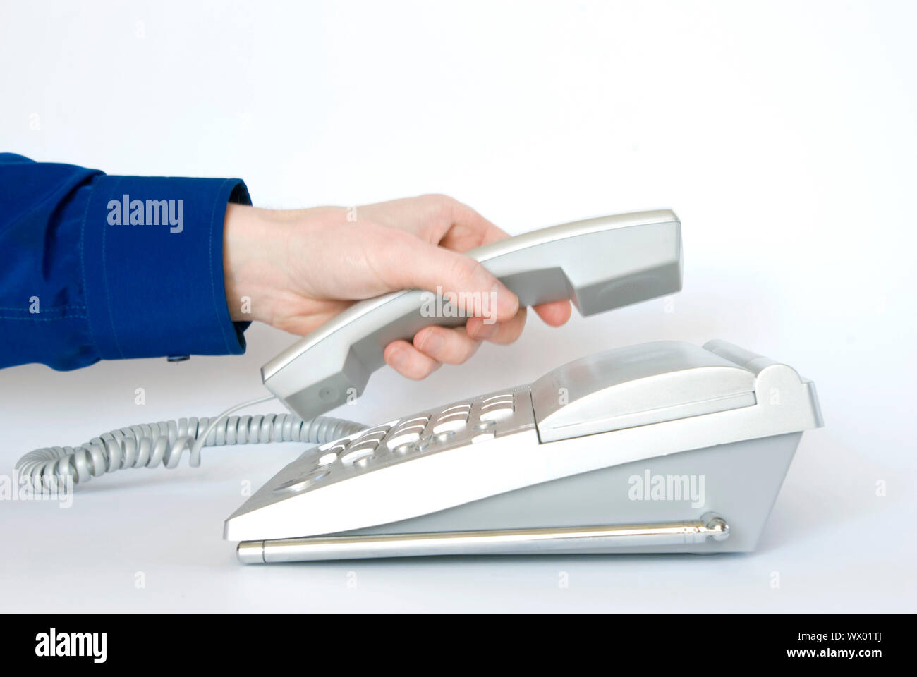 telephone receiver in hand isolated on white Stock Photo - Alamy