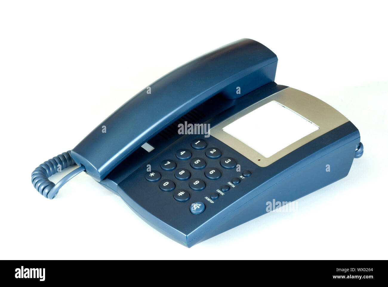 blue office telephone on a white background Stock Photo - Alamy