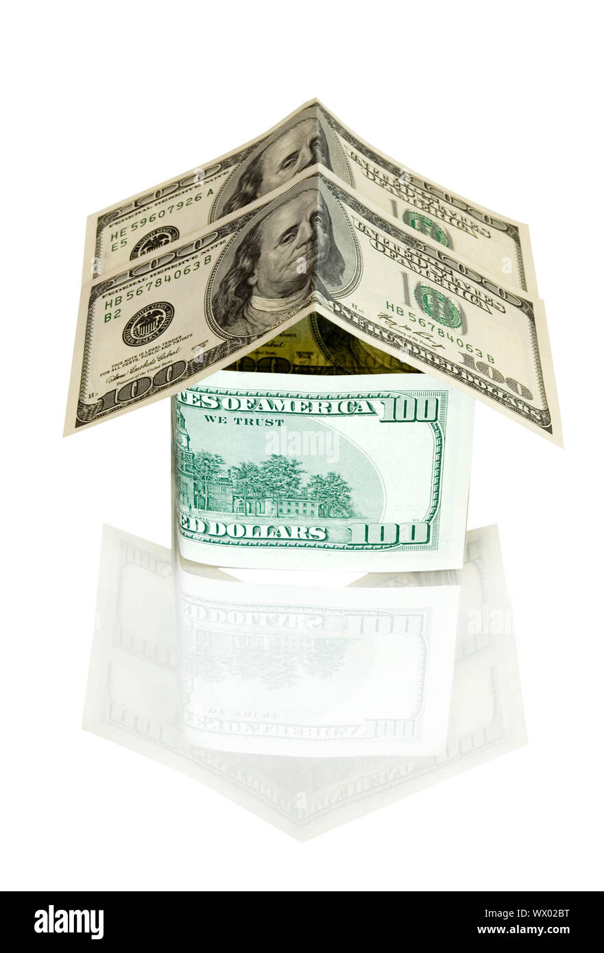 Money house on white background Stock Photo - Alamy
