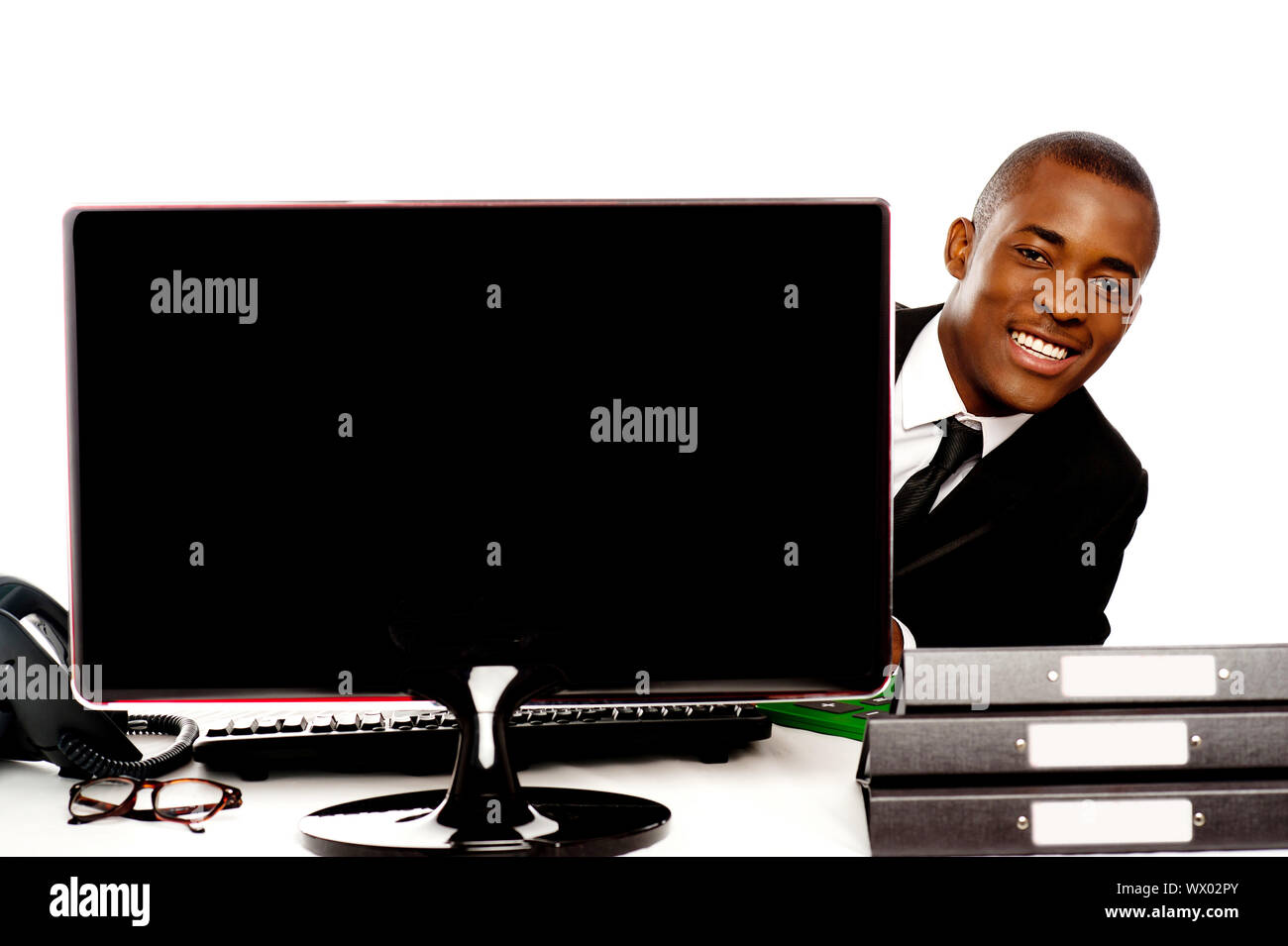 Screen computer man behind Cut Out Stock Images & Pictures - Alamy