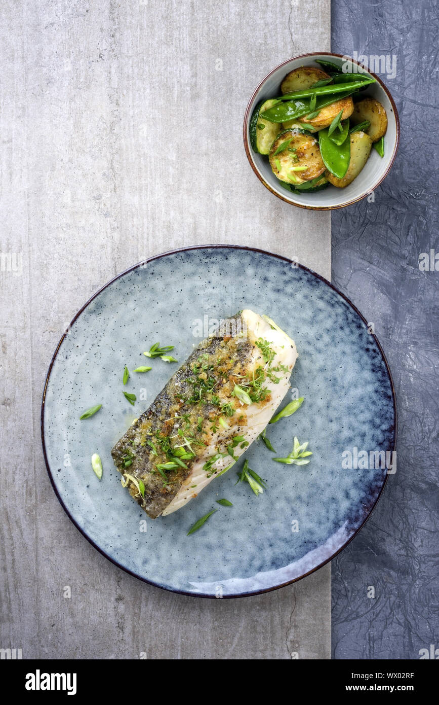 Japanese Fried cod fish fillet with vegetable and potatoes as top-view ...
