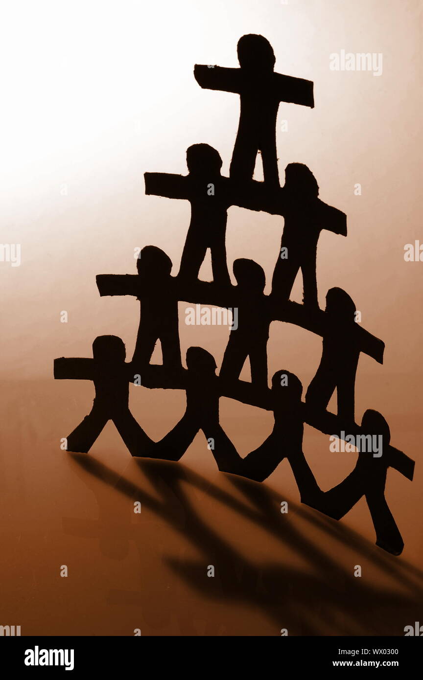 team of paper man showing concept of teamwork Stock Photo - Alamy