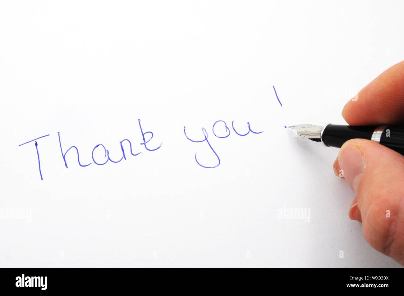 thank you message on paper with pen Stock Photo - Alamy