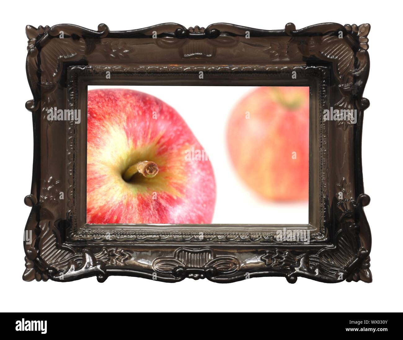 apple fruit in image frame isolated on white background Stock Photo - Alamy