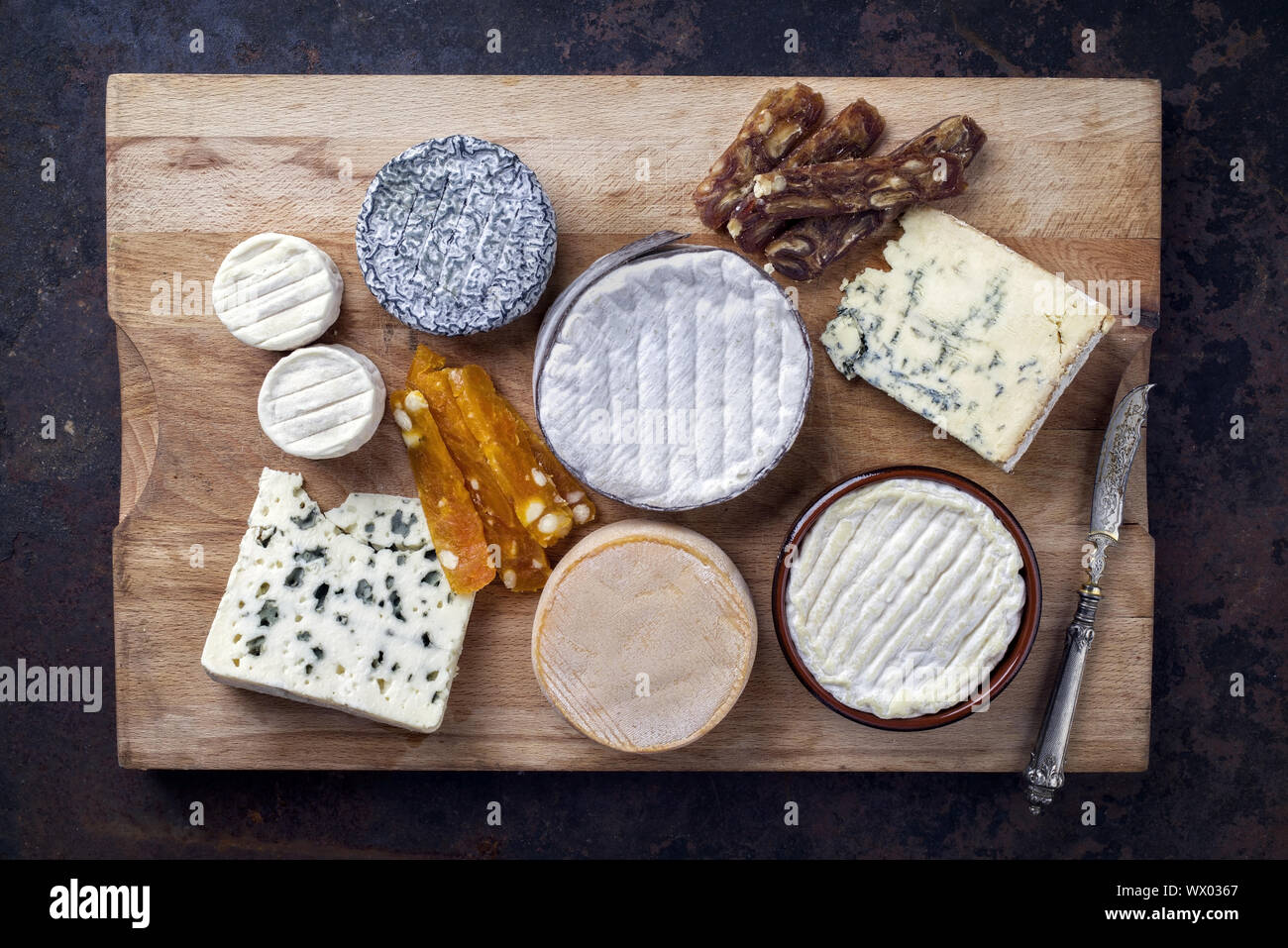 French Cheese Platter with Spanish Dulce de Membrillo as top view on a ...