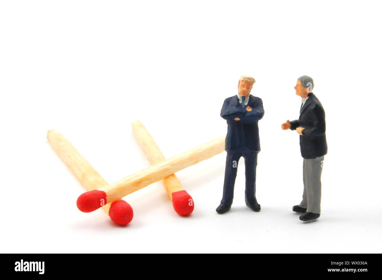 business man and matches isolated on white background Stock Photo - Alamy