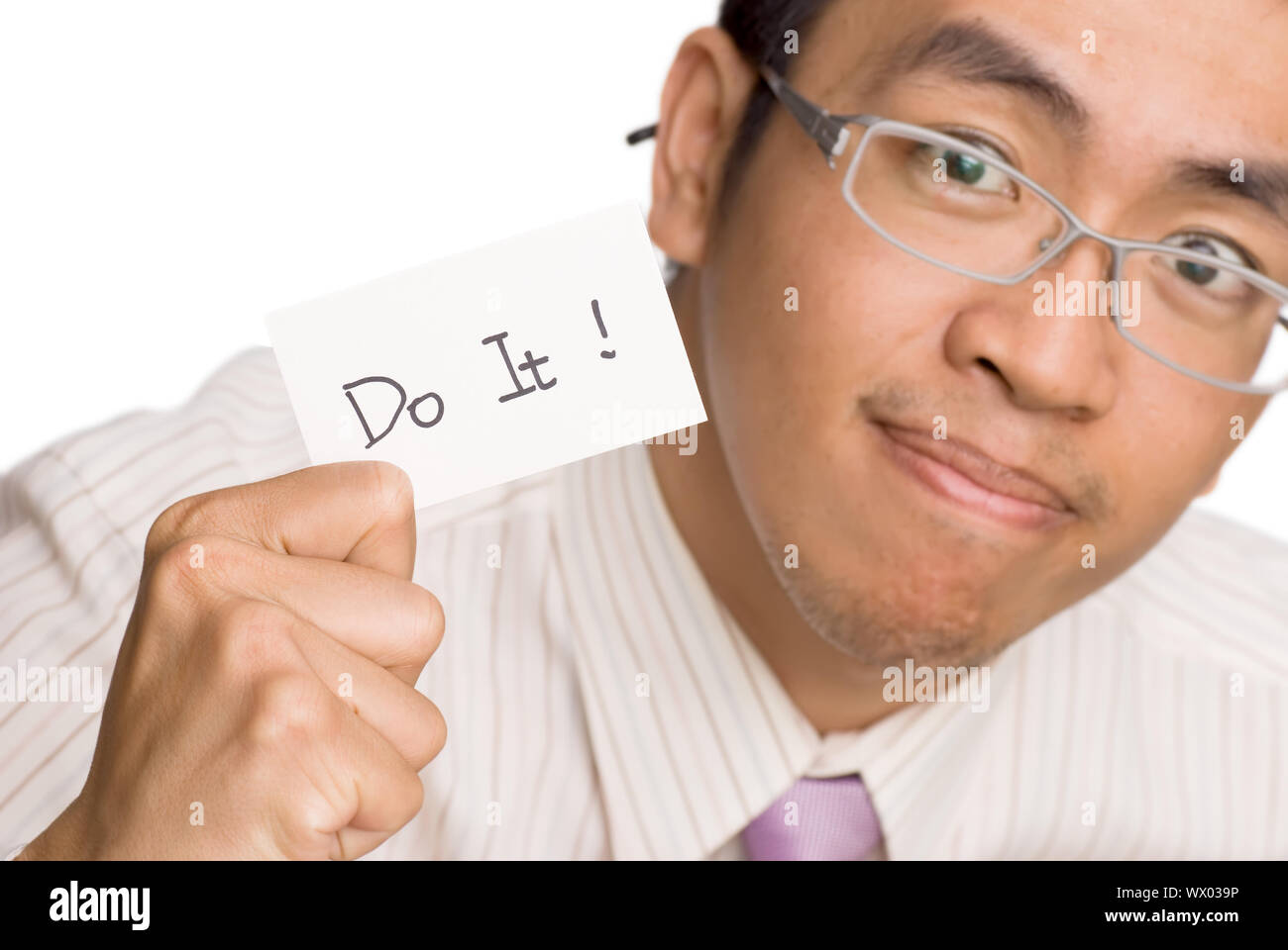 Business man show do it card on white background Stock Photo - Alamy