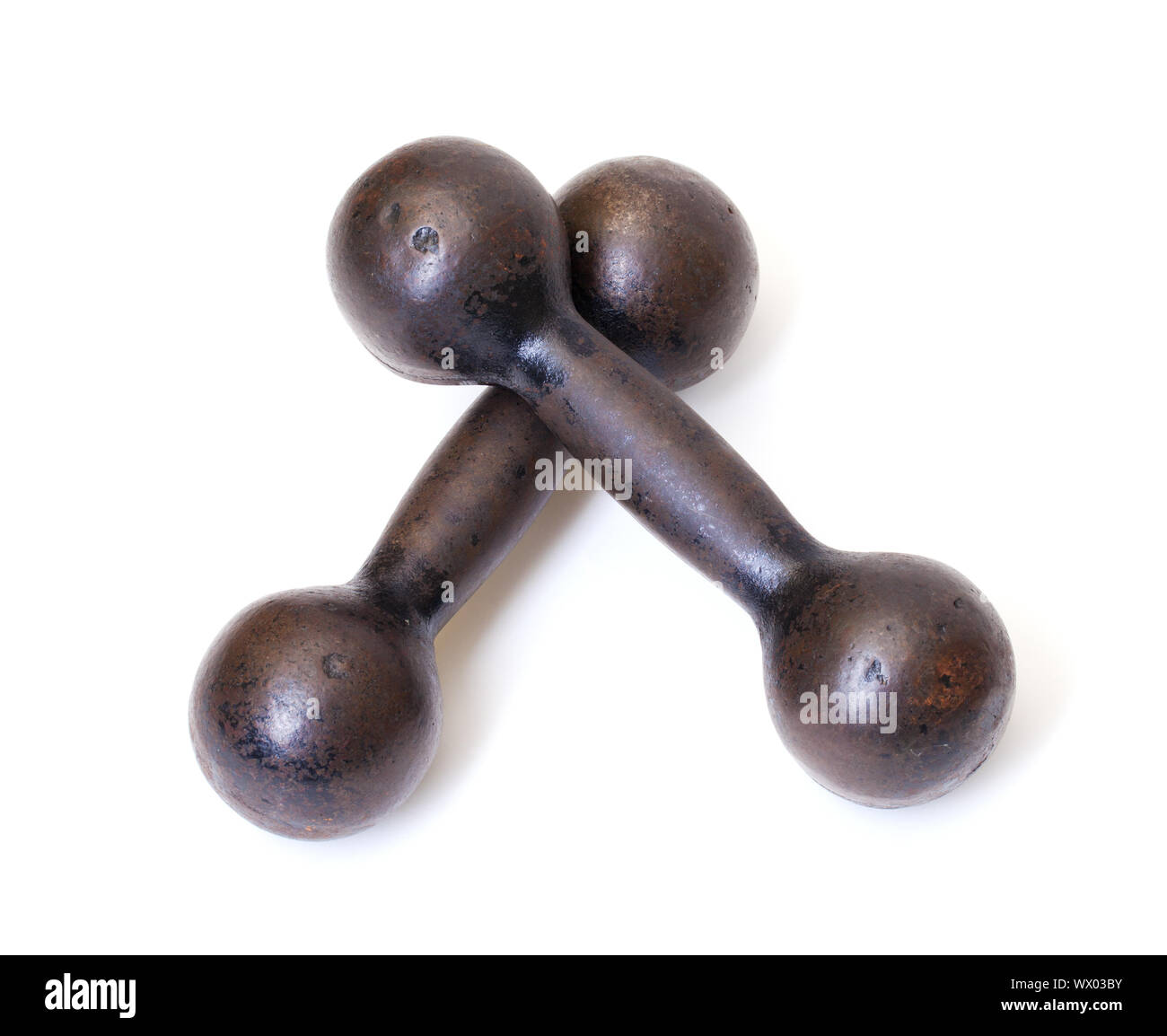 Old Rusty Dumbbells on white background Stock Photo - Alamy