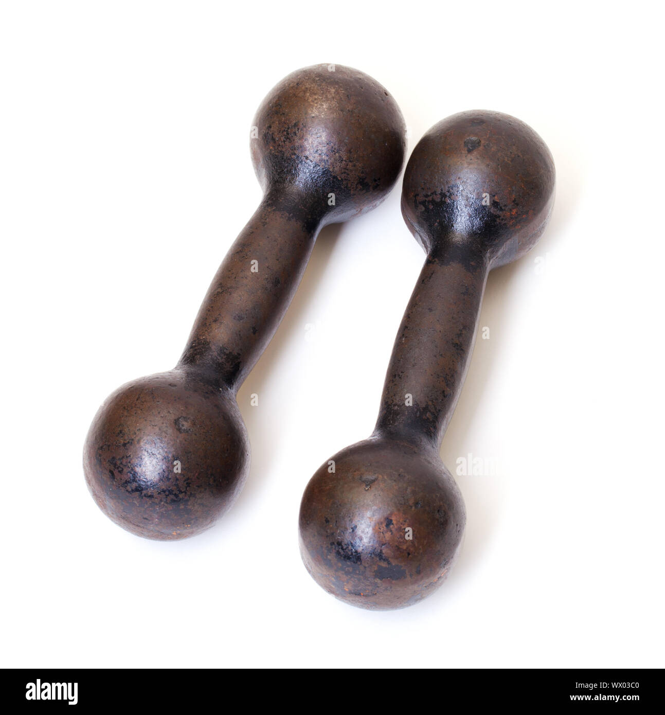 Old Rusty Dumbbells on white background Stock Photo - Alamy
