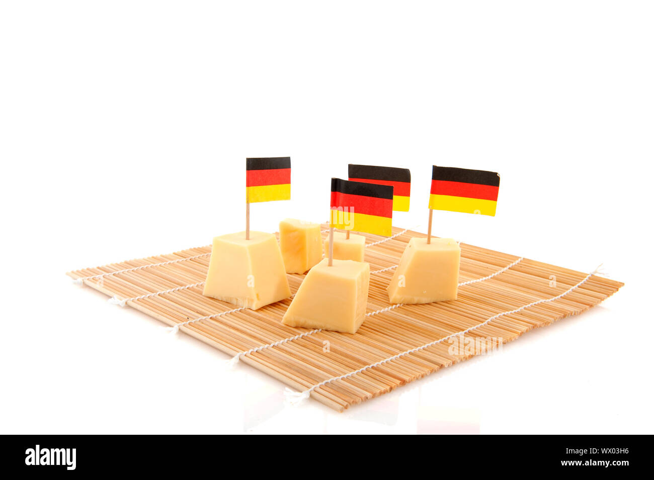German cheese cubes with flags isolated over white Stock Photo - Alamy
