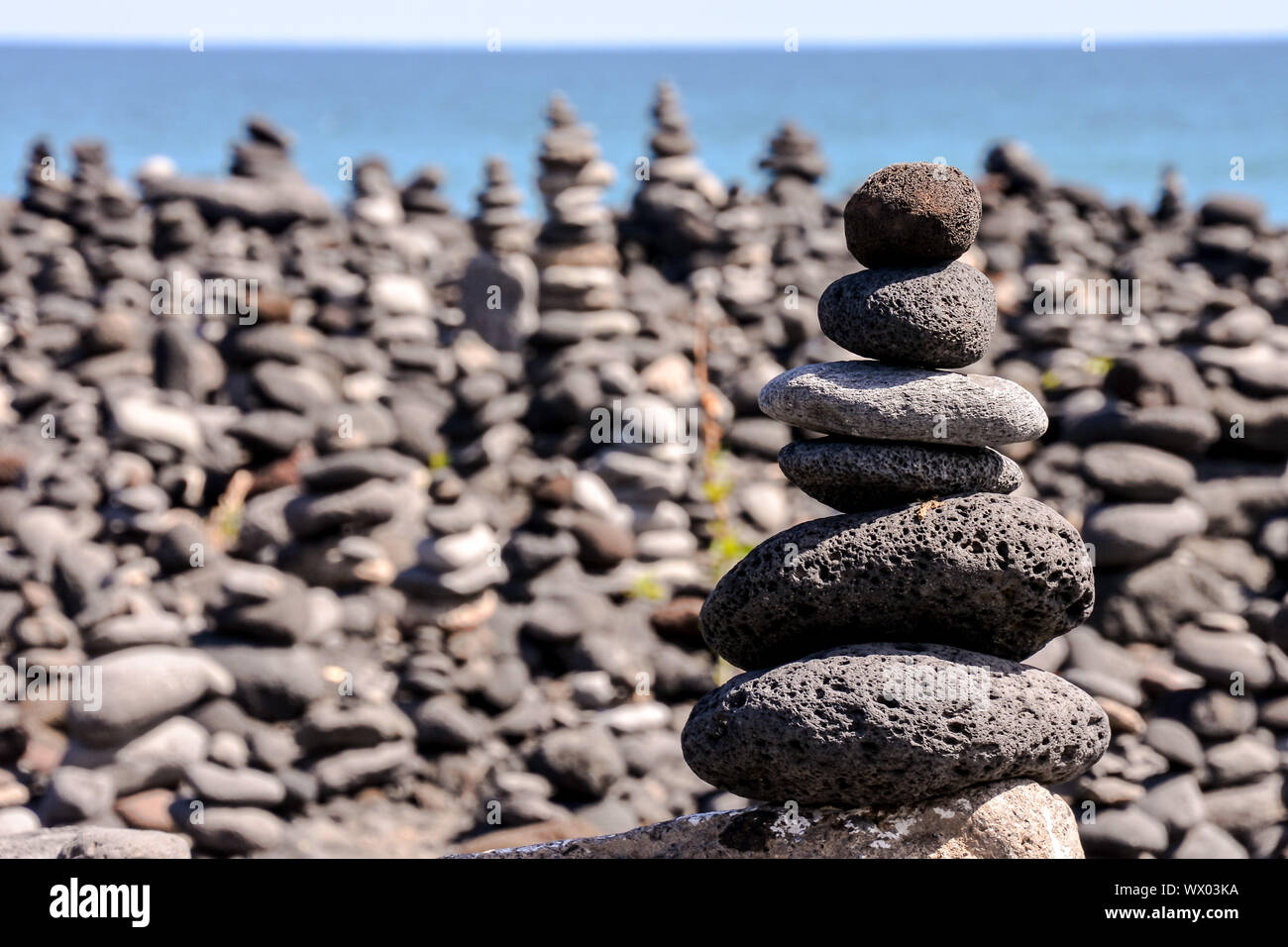 Stack of stones on the sea beach Stock Photo - Alamy