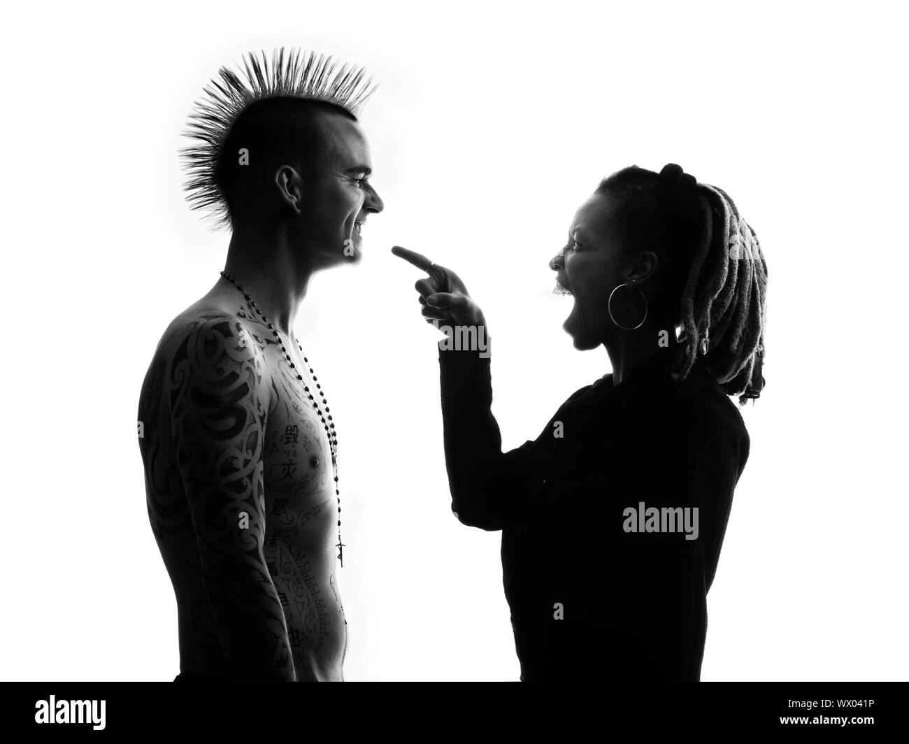Man with Mohawk and Woman wearing Dreadlocks Stock Photo - Alamy