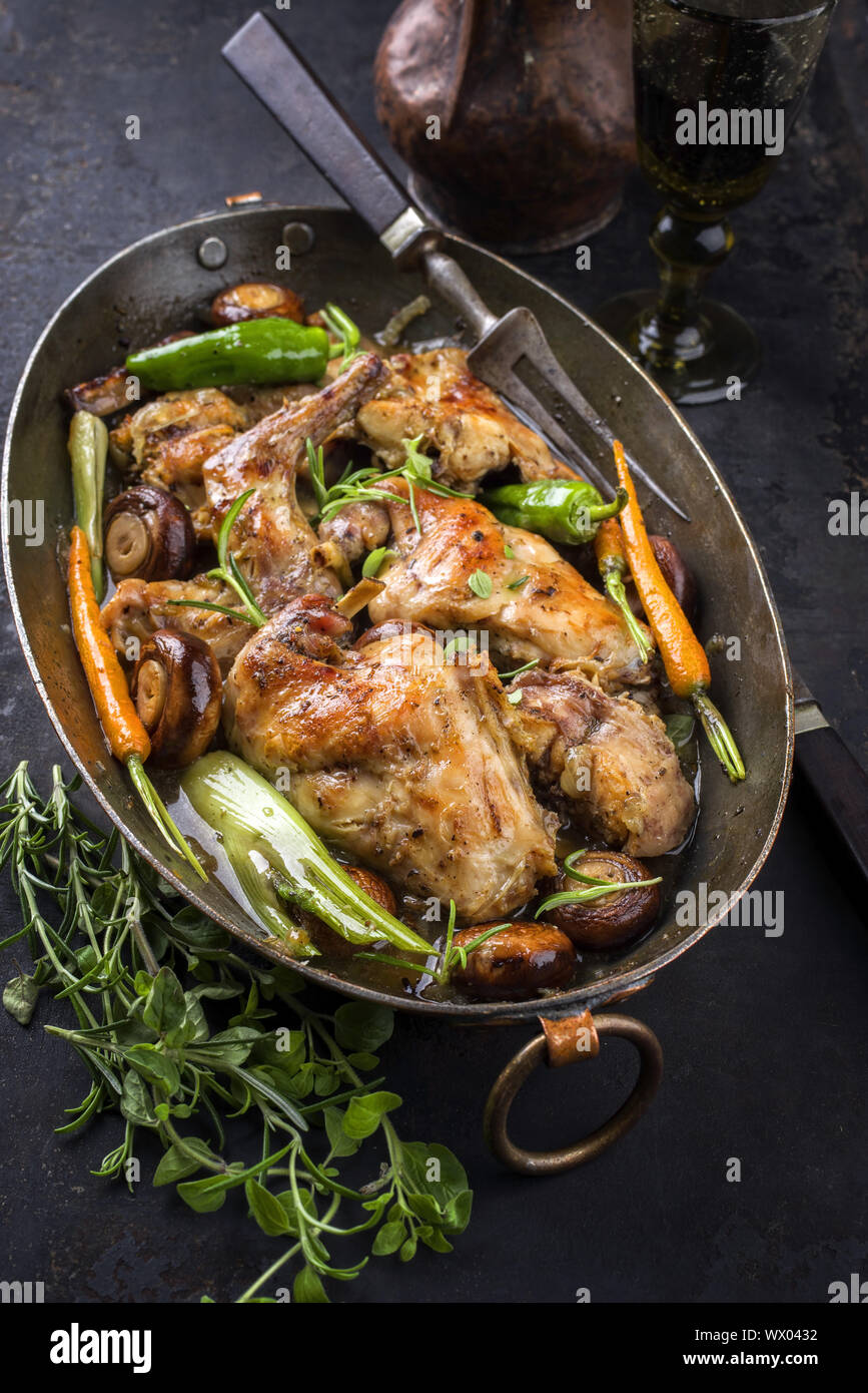 Rabbit with Vegetable and Mushrooms as top view in a Stewpot Stock ...