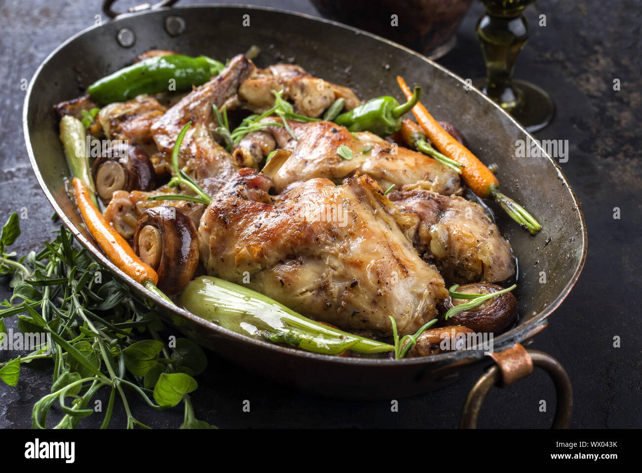 Rabbit with Vegetable and Mushrooms as top view in a Stewpot Stock ...