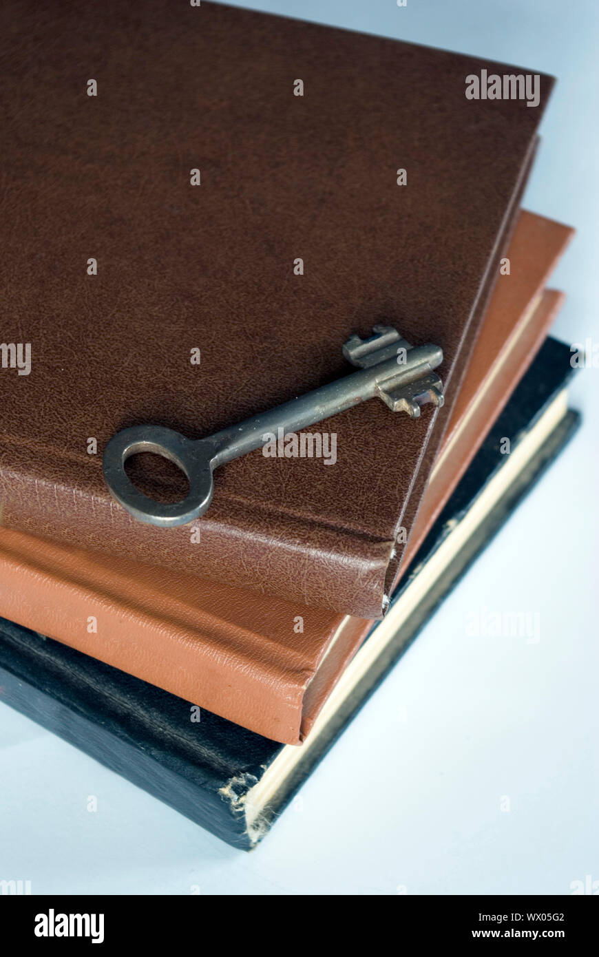 Key to knowledge it is books Stock Photo - Alamy