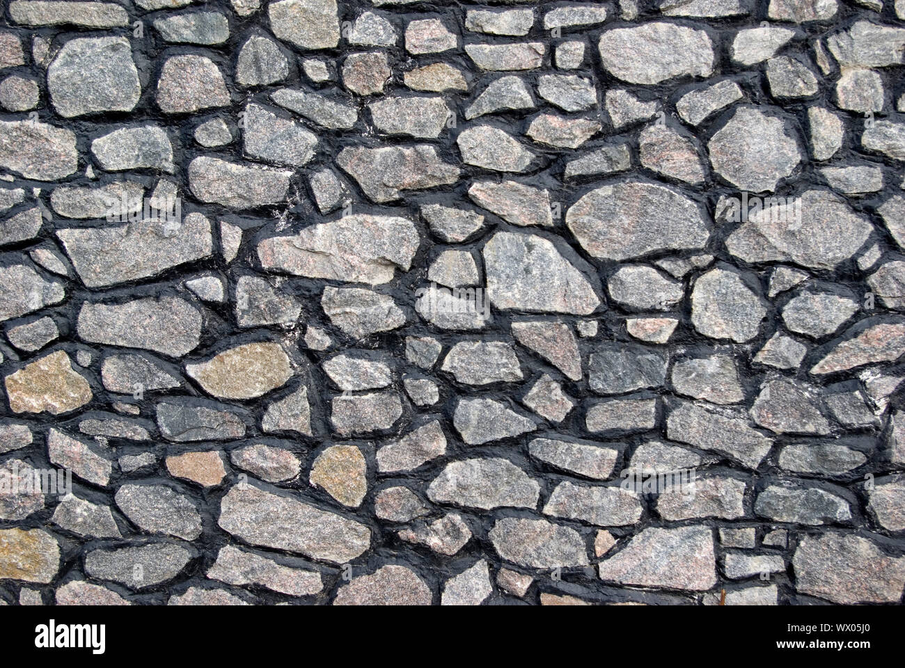 Stone wall interesting shadows hi-res stock photography and images - Alamy