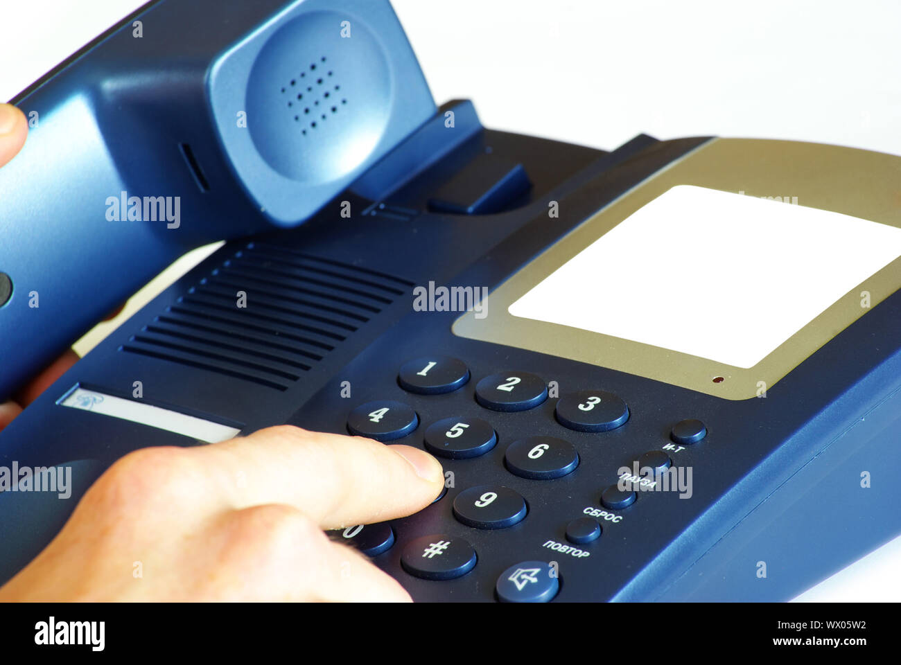 finger with blue telephone keypad Stock Photo - Alamy