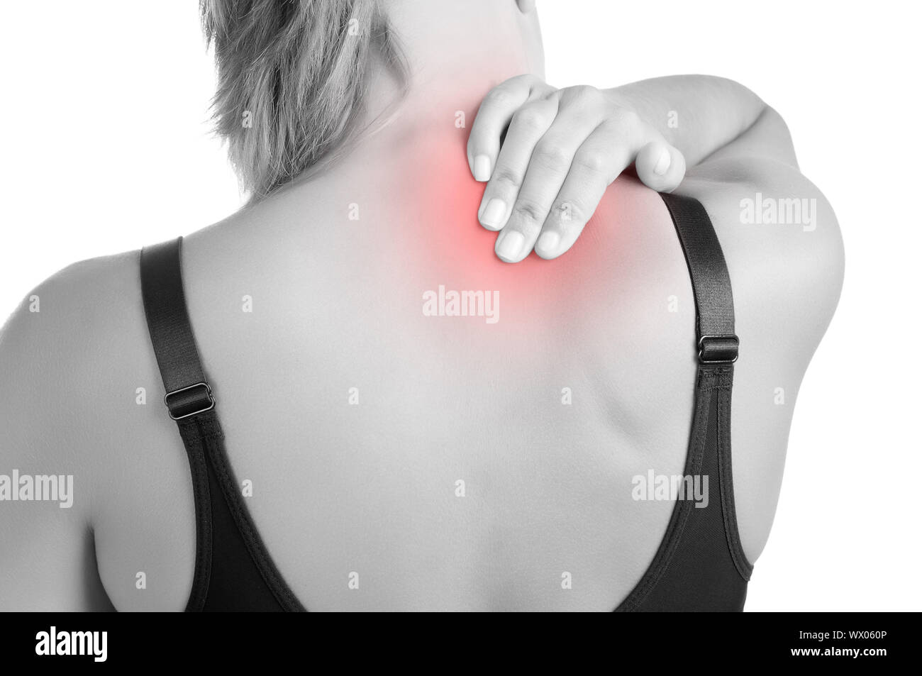 Young woman with pain in the back of her neck Stock Photo - Alamy