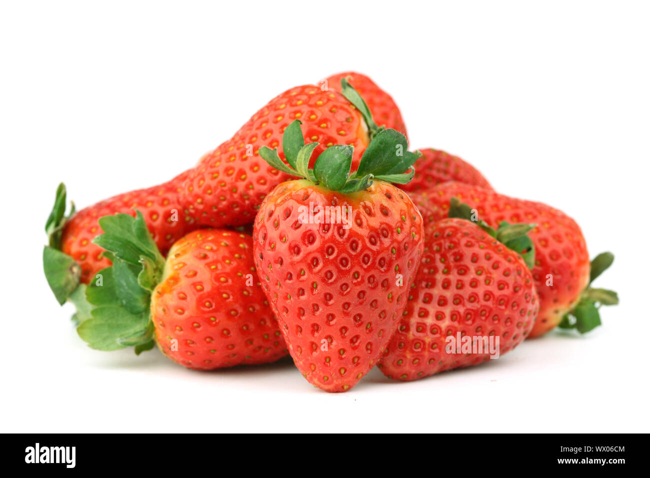 strawberry pile on white background Stock Photo - Alamy