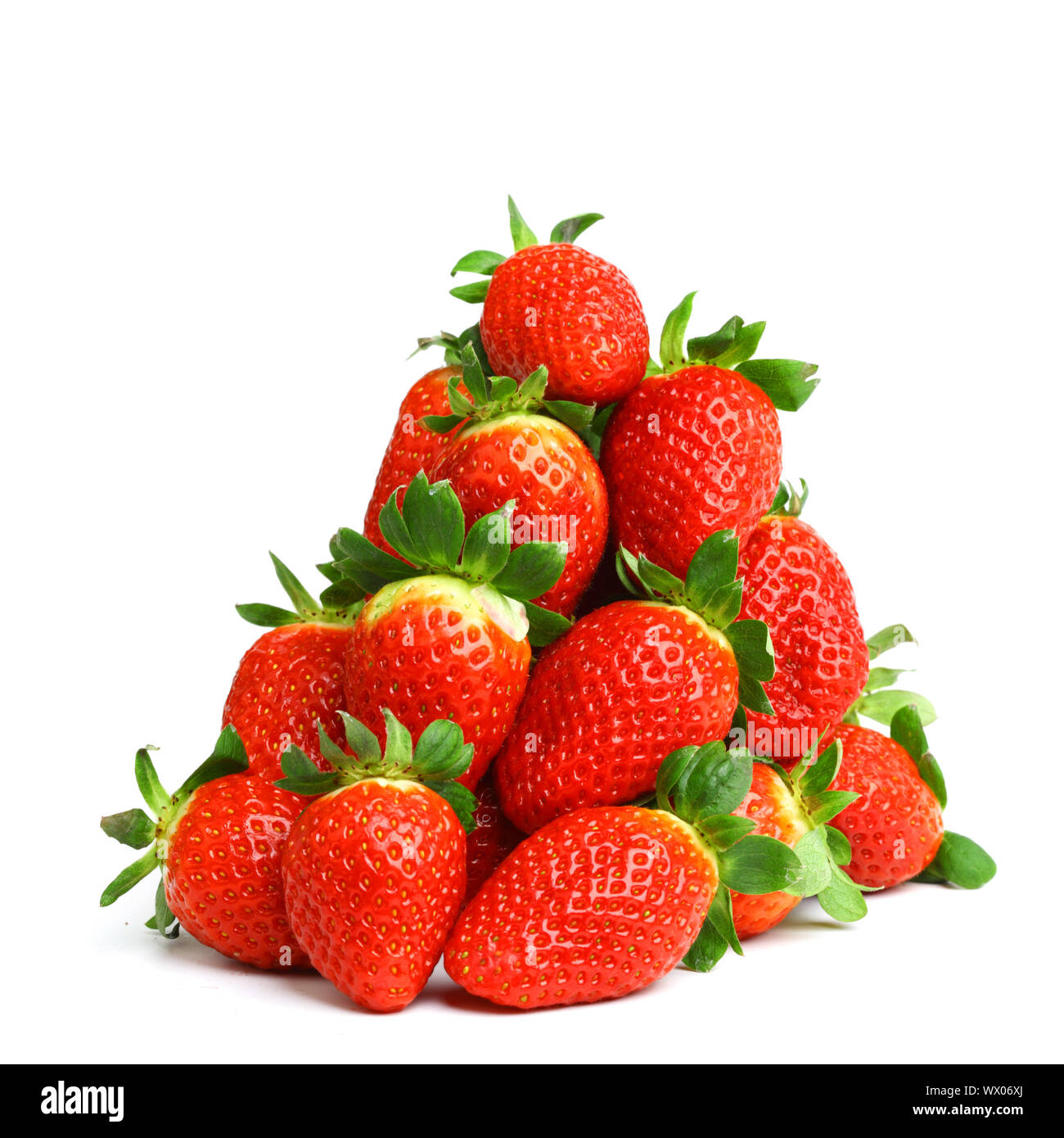 strawberry pile isolated on white background Stock Photo - Alamy