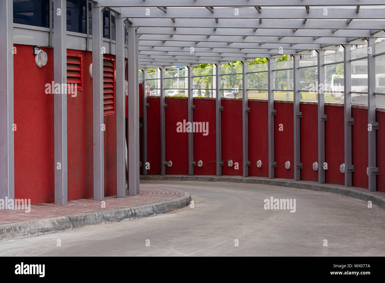 Access to covered parking, ring road, building with bright orange ...