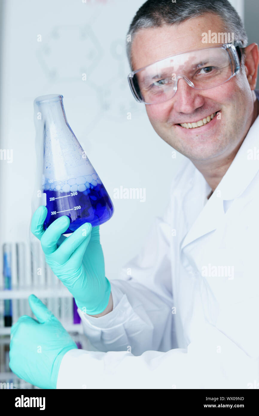 Chemistry Scientist conducting experiments in laboratory Stock Photo ...