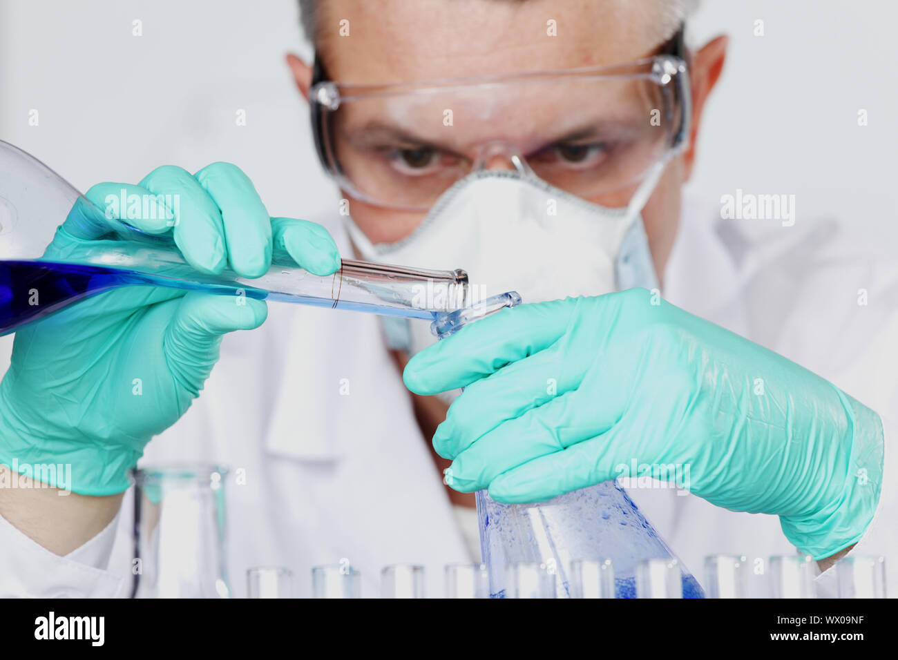 Chemistry Scientist conducting experiments in laboratory Stock Photo ...