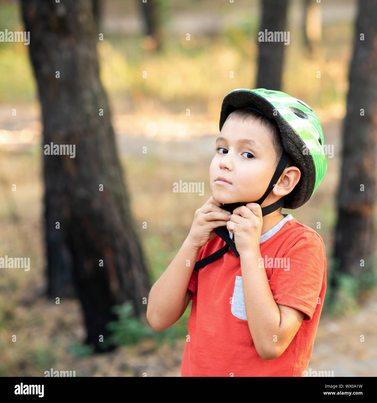 Hand on helmet hi-res stock photography and images - Alamy