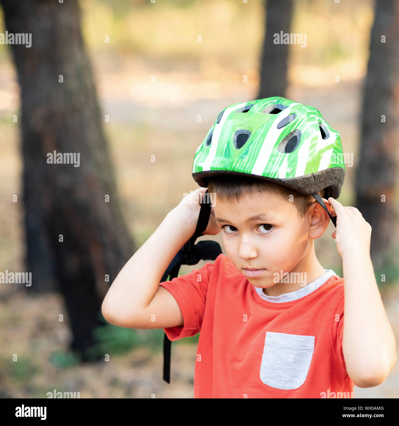 Hand on helmet hi-res stock photography and images - Alamy