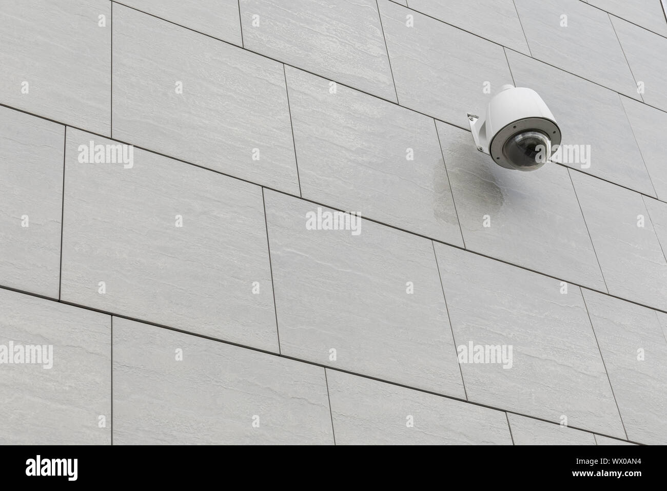 Security IR camera for city safety monitoring on gray stone tile on ...