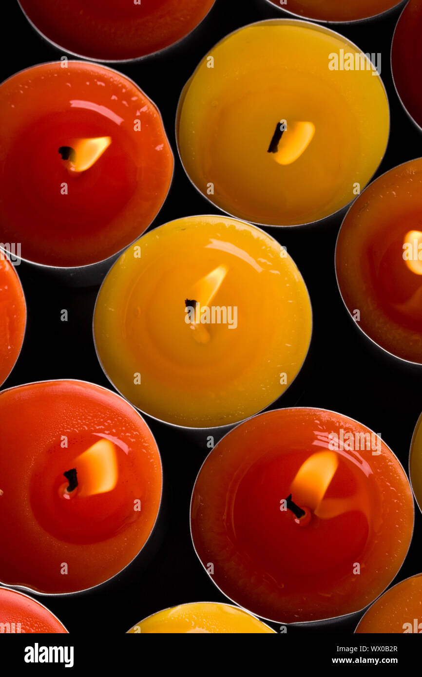 red and yellow flaming candles background Stock Photo - Alamy