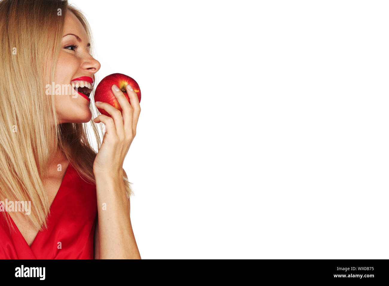 woman eat red apple on white background Stock Photo - Alamy