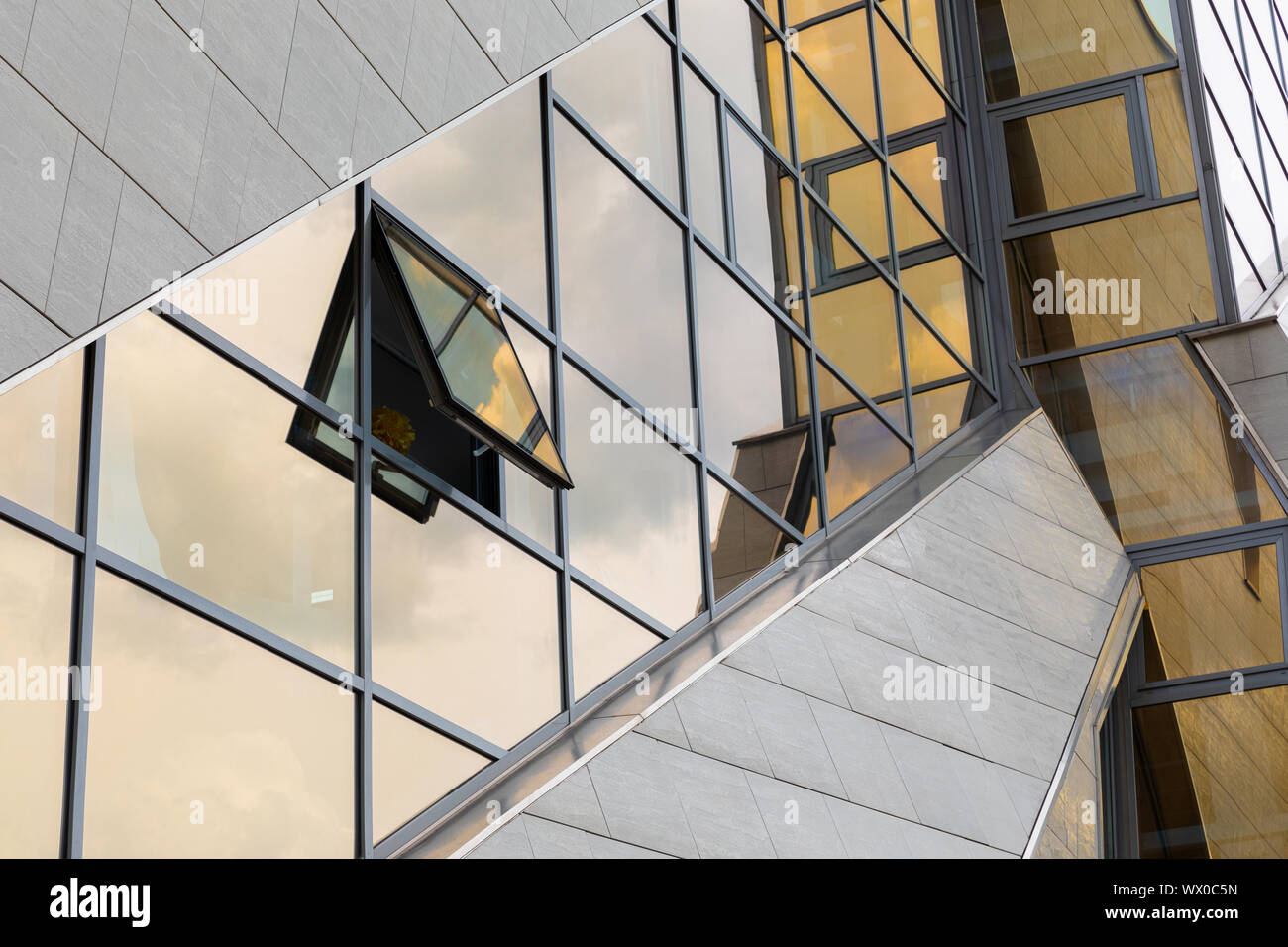 Modern architecture geometry construction with glass building facade ...
