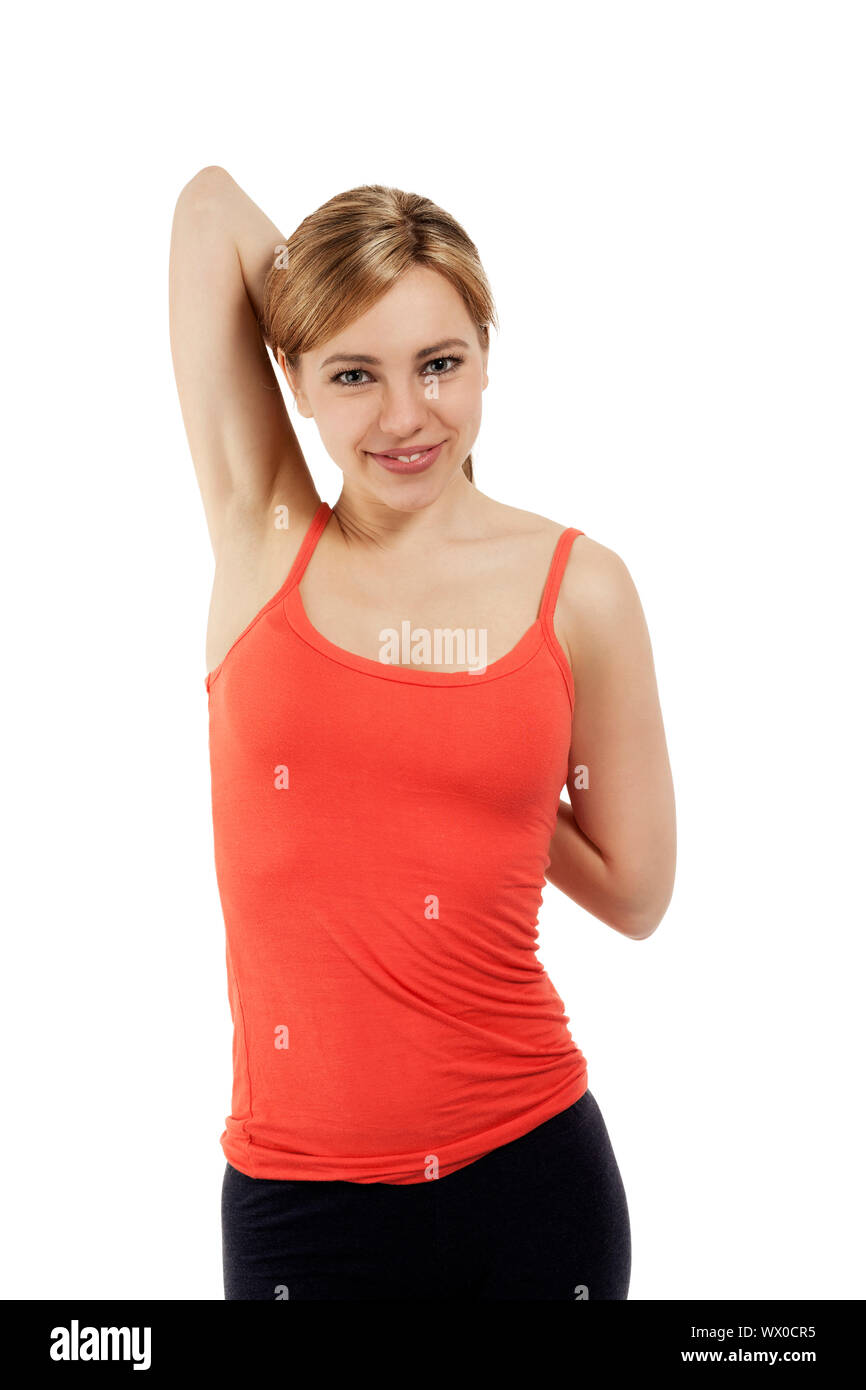 young fitness woman stretching her arms on white background Stock Photo ...