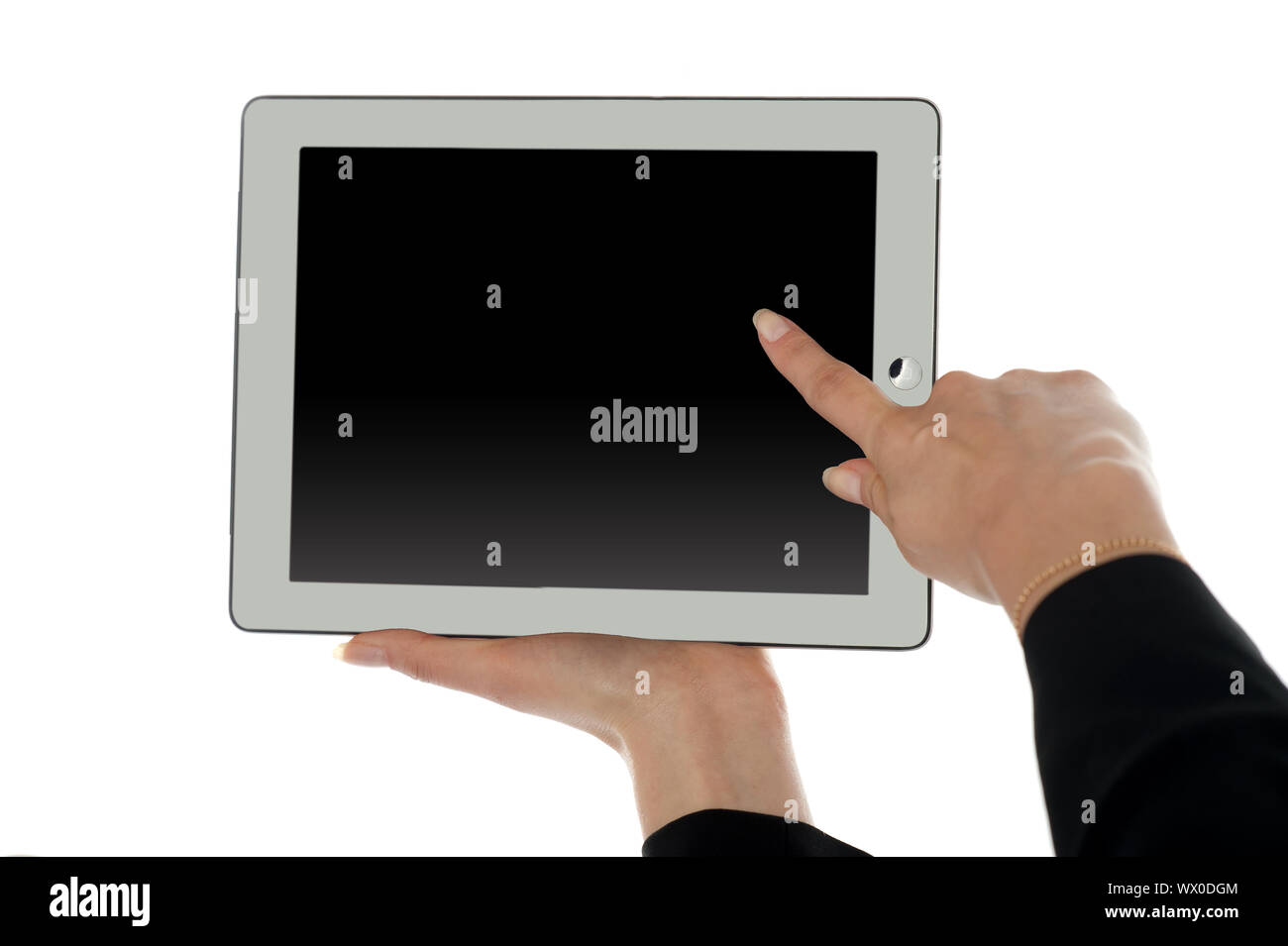 Female finger pointing at blank screen of tablet pc. All on white ...