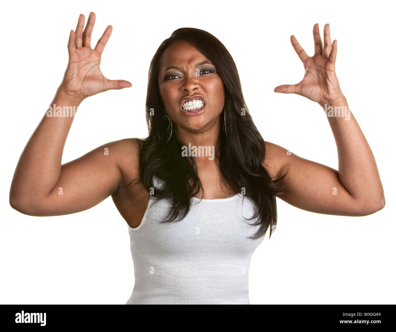 Angry woman with teeth clenched and hands out Stock Photo - Alamy