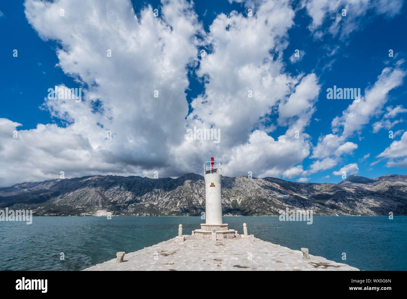 Lighthouse on the island of Our Lady on the Rock Stock Photo - Alamy