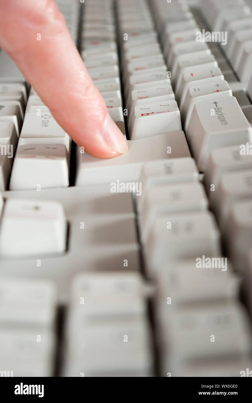 Fingers type a text on the computer keyboard Stock Photo - Alamy