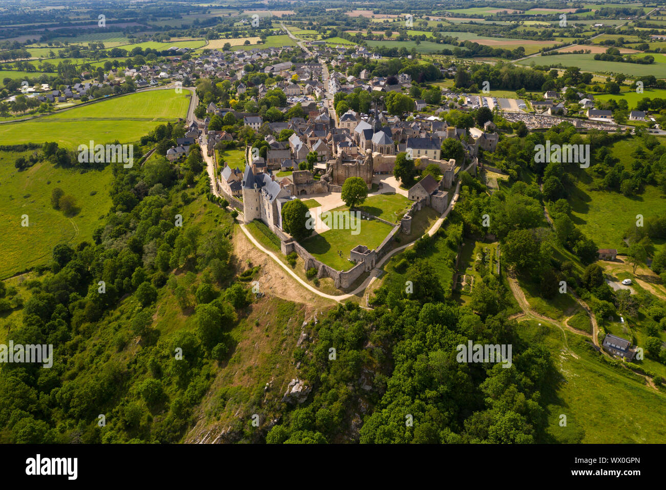Drone view of the hilltop village of Saint-Suzanne in the Mayenne area ...
