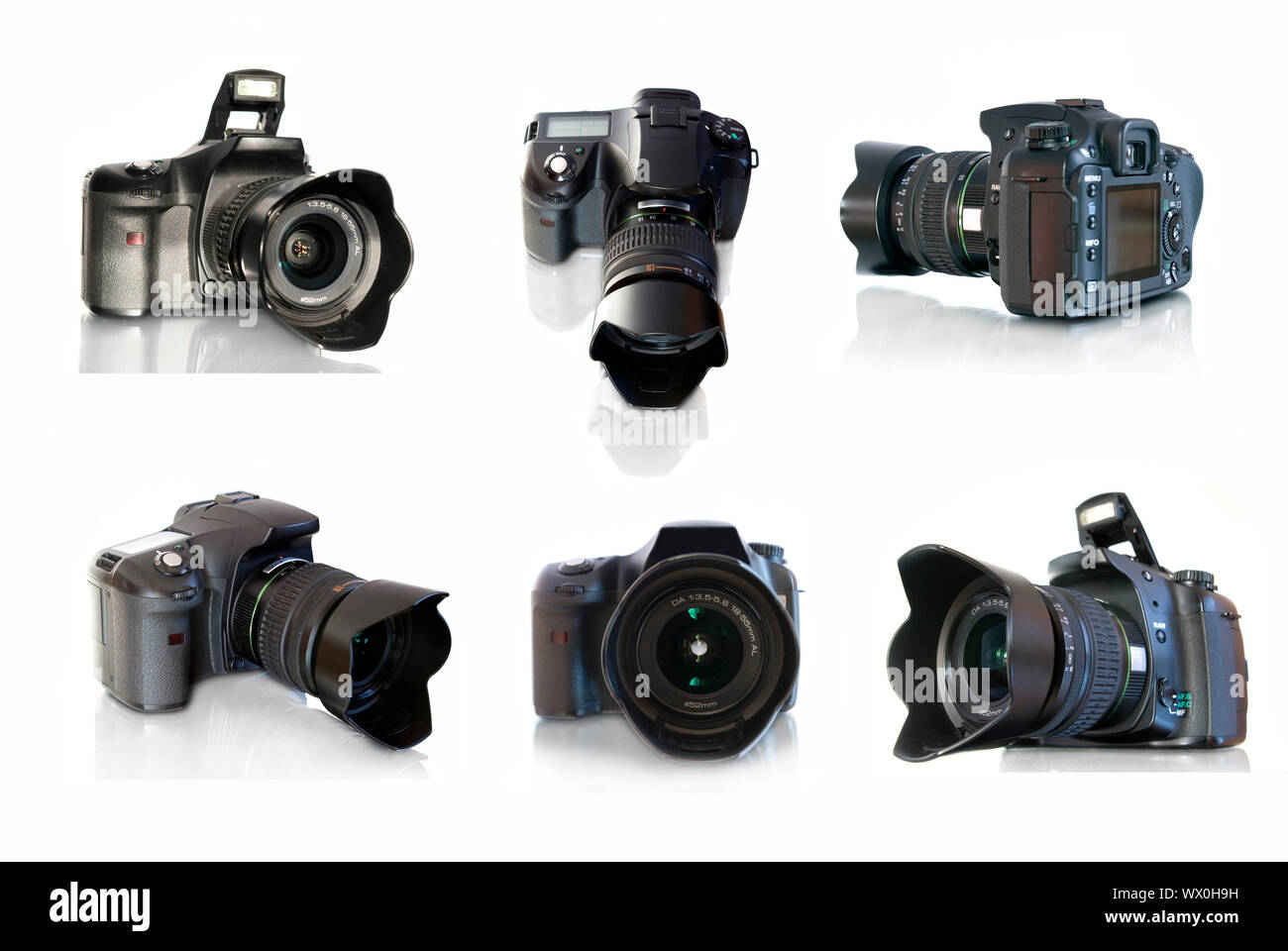 photo camera isolated on white Stock Photo - Alamy
