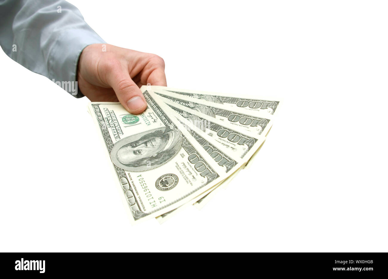 Money in hand isolated on white background Stock Photo - Alamy